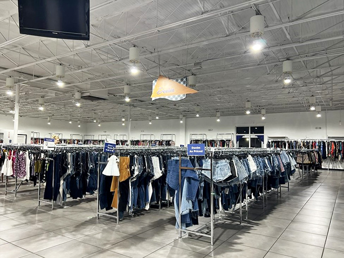 The denim section: where jeans of all eras congregate like a high school reunion of pants that still fit somebody somewhere.