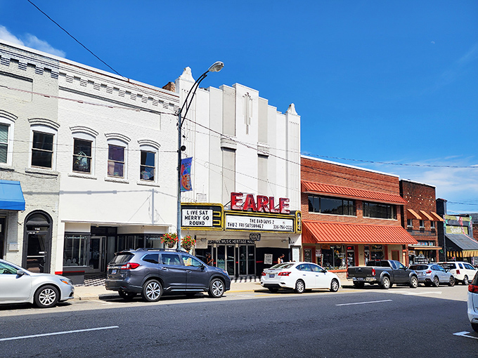 The Earle Theatre's classic marquee lights up downtown, promising entertainment that costs less than a fancy coffee in the big city.