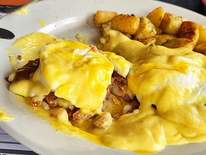 Eggs Benedict that would make a brunch snob weep with joy. Golden hollandaise cascading over perfectly poached eggs &ndash; breakfast nirvana has been achieved.