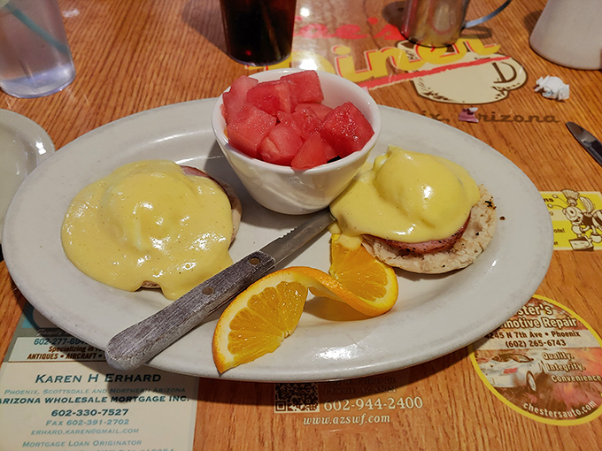 Eggs Benedict that would make a brunch snob weep with joy &ndash; perfectly poached eggs wearing hollandaise like a sunny yellow tuxedo.