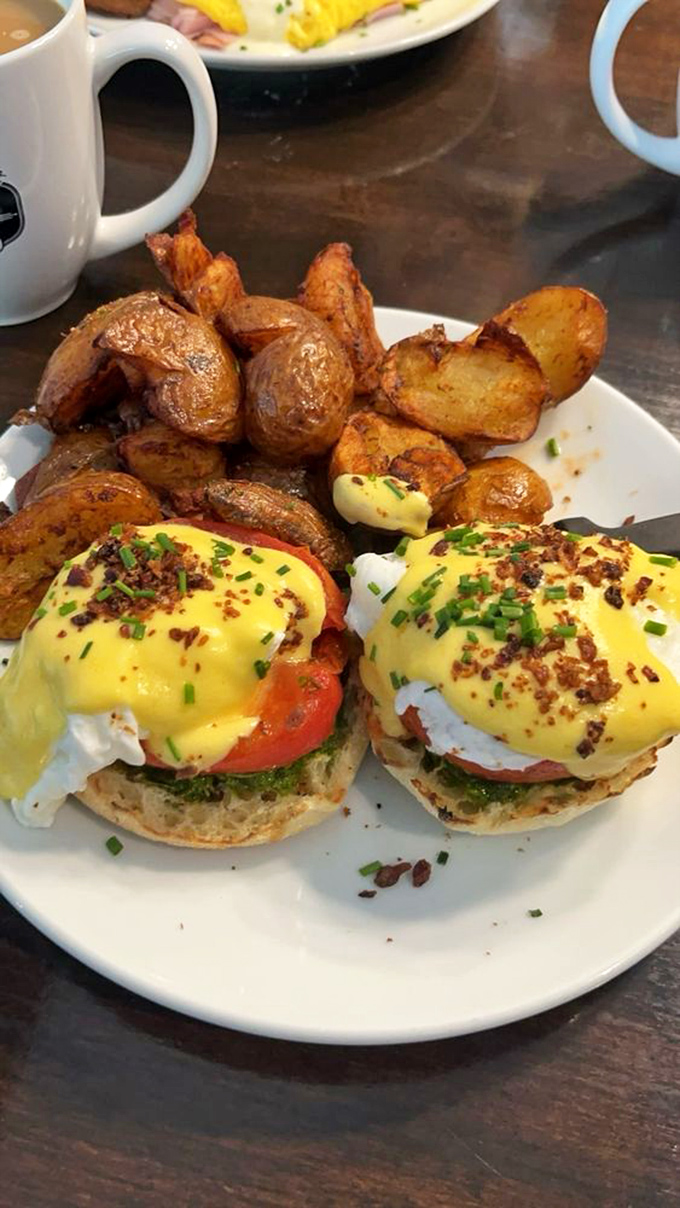 Eggs Benedict reimagined with such perfection that Benedict Arnold would have stayed loyal if he'd tasted these instead.