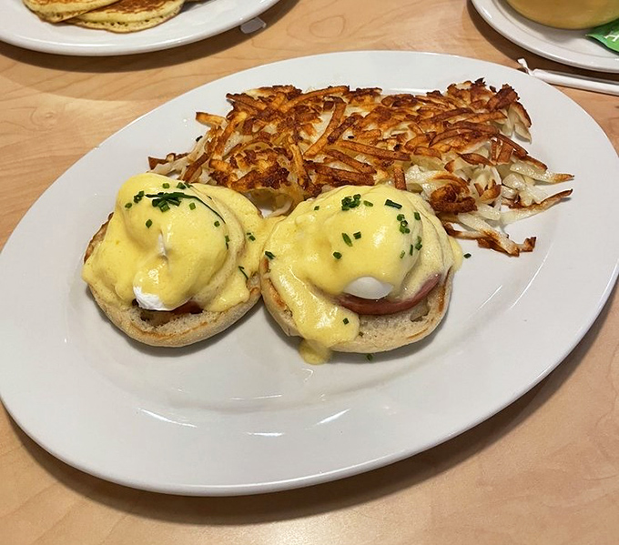 Eggs Benedict done right&mdash;perfectly poached eggs nestled on Canadian bacon, draped in hollandaise that cascades like a yellow waterfall of deliciousness.