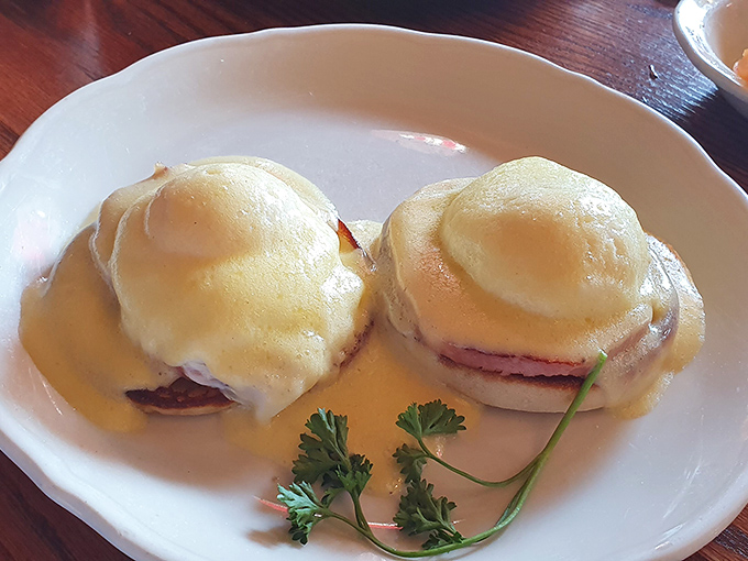 Eggs Benedict done right &ndash; two perfectly poached eggs nestled on English muffins, draped in hollandaise that's rich enough to make a cardiologist wince.