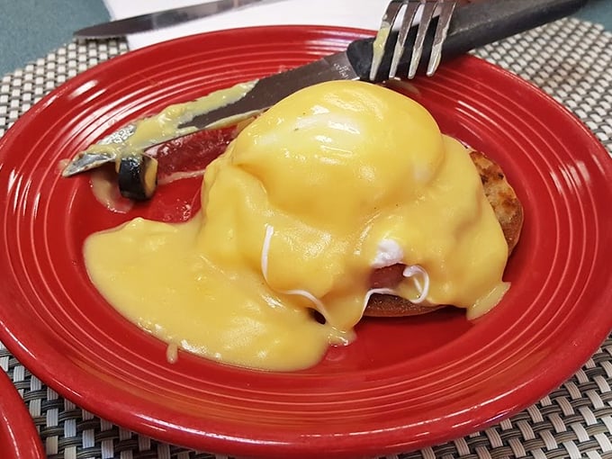 Eggs Benedict that would make a brunch snob weep with joy. The hollandaise cascades like a golden waterfall of breakfast perfection.