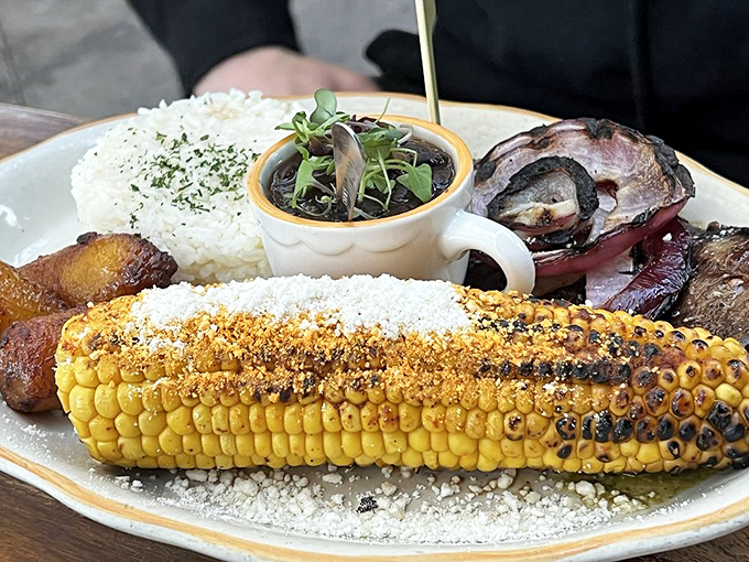 Rice, beans, grilled corn, and perfectly cooked meat&mdash;this plate understands that simple done right beats complicated done wrong.