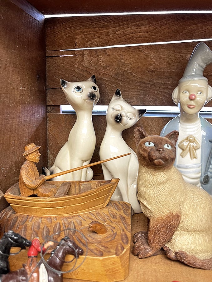These ceramic cats aren't judging your purchases&mdash;they're silently approving your excellent taste in vintage collectibles.
