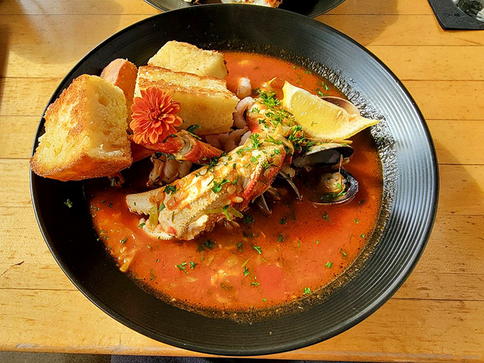 This seafood stew isn't just a meal; it's a maritime celebration in a bowl, complete with crusty bread for the victory lap.
