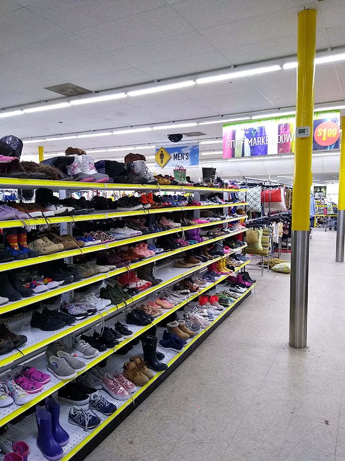 Footwear fantasyland where your next favorite shoes are waiting to meet you. Yellow shelving: practical for organization, impossible to miss even for the most distracted shopper.