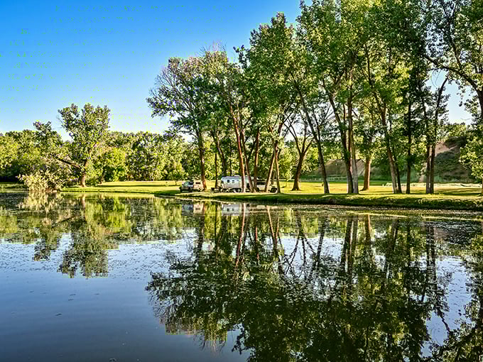 Fort Buenaventura Park provides tranquil green spaces where your retirement dollars stretch as far as these reflective waters on a calm summer day.