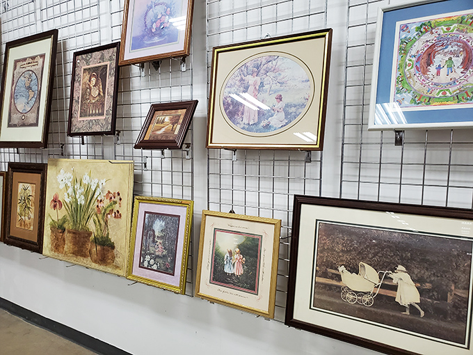 Wall art that once graced grandma's hallway now waits for new admirers. That garden painting might be just the thing for your guest bathroom.