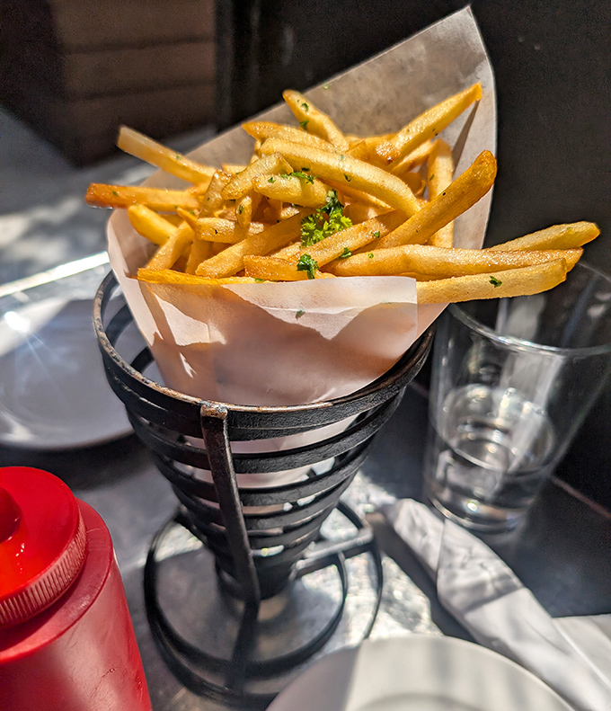 French fries so perfectly golden they deserve their own museum exhibit. Crispy on the outside, fluffy within, and served with enough garlic to keep vampires at bay.