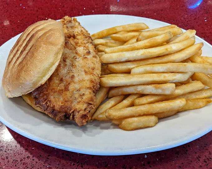 Golden fries that achieve the impossible balance &ndash; crispy exterior giving way to fluffy potato clouds within. Pure alchemy.