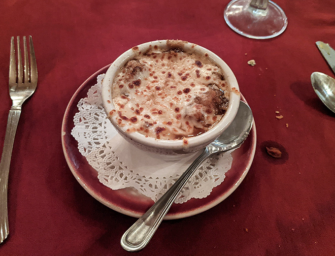 French onion soup with a cheese cap so glorious it deserves its own national anthem. Bubbling, golden, and utterly irresistible.