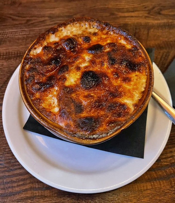 This isn't just French onion soup &ndash; it's a bubbling cauldron of cheese-capped comfort that would make Julia Child weep with joy.