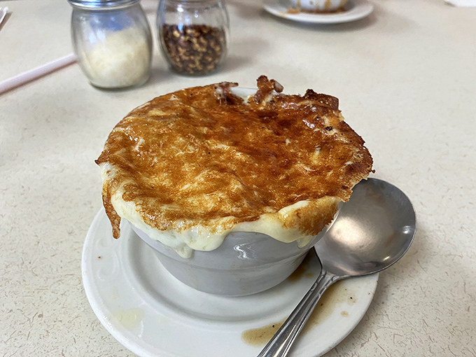 French onion soup with a cheese pull that deserves its own Olympic medal. Bubbling, golden, and worth every potential chin burn.