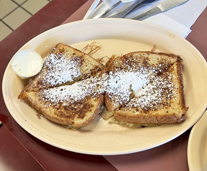 French toast that's dressed for success with a dusting of powdered sugar. Simple, elegant, and ready for its close-up on your taste buds.