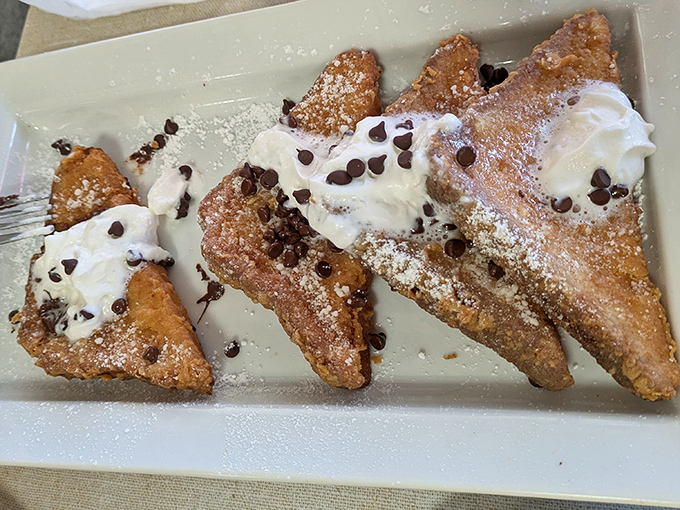French toast that's crossed the line from breakfast to dessert, with whipped cream and chocolate chips that make Monday mornings bearable again.