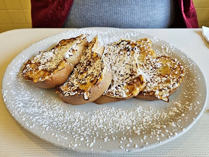 French toast dusted with powdered sugar like the first perfect snowfall of winter. Simple pleasures that remind you why breakfast is undefeated.