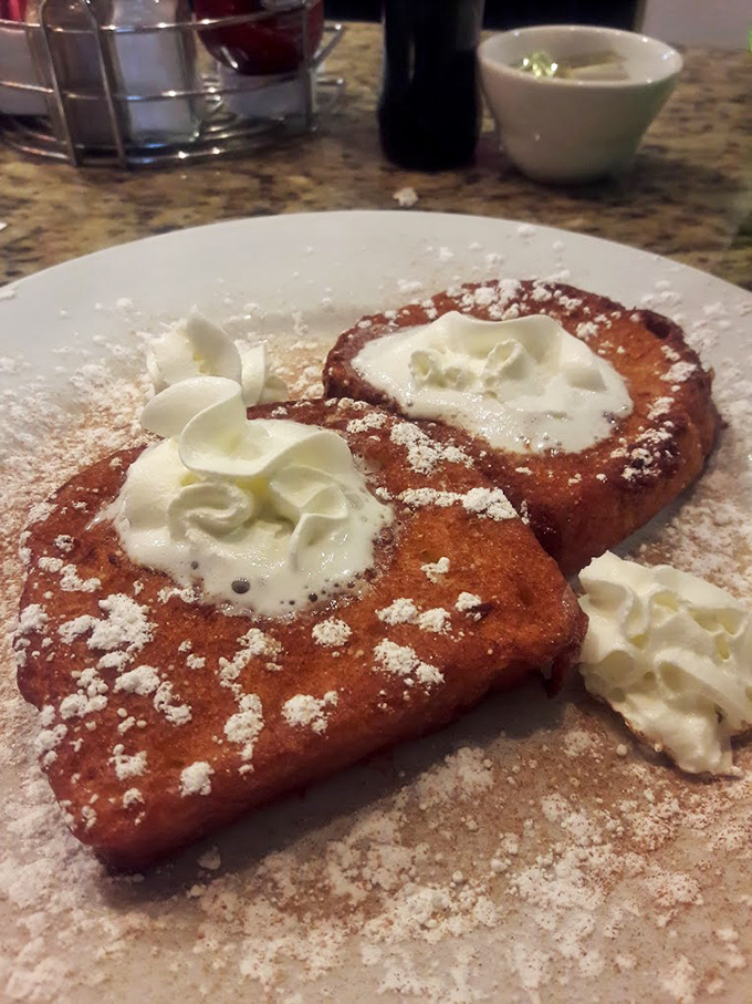 French toast that's achieved celebrity status&mdash;dressed in powdered sugar with dollops of whipped cream that melt like snowflakes on a warm morning.