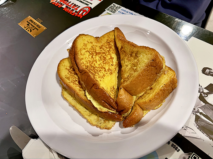 French toast so golden and beautiful it deserves its own Instagram account, or at least a standing ovation.