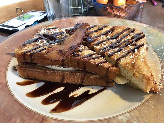 French toast that's had a spa treatment&mdash;pampered with chocolate drizzle, grilled to golden perfection, and ready for its close-up on your taste buds.