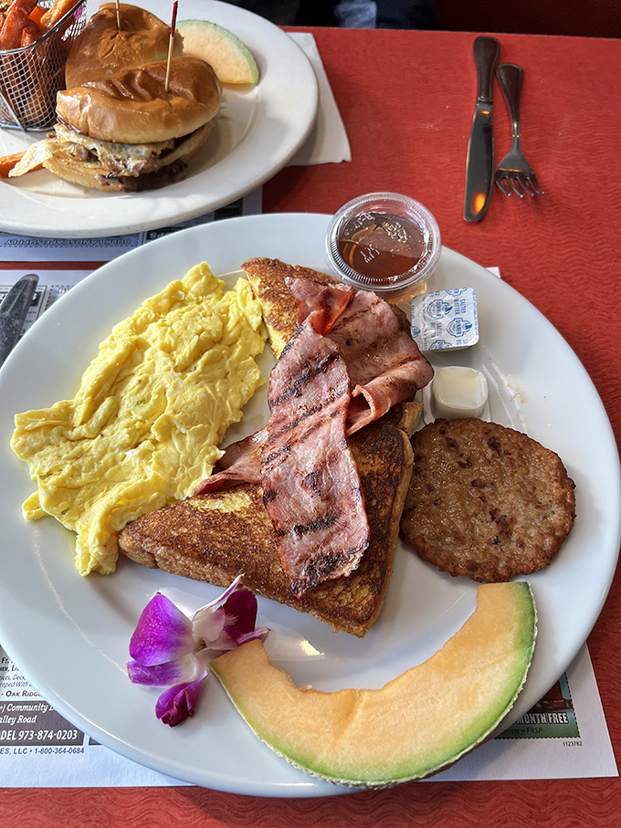 This breakfast platter doesn't just break the fast&mdash;it demolishes it with perfect eggs, toast, and that slice of cantaloupe pretending to be healthy.