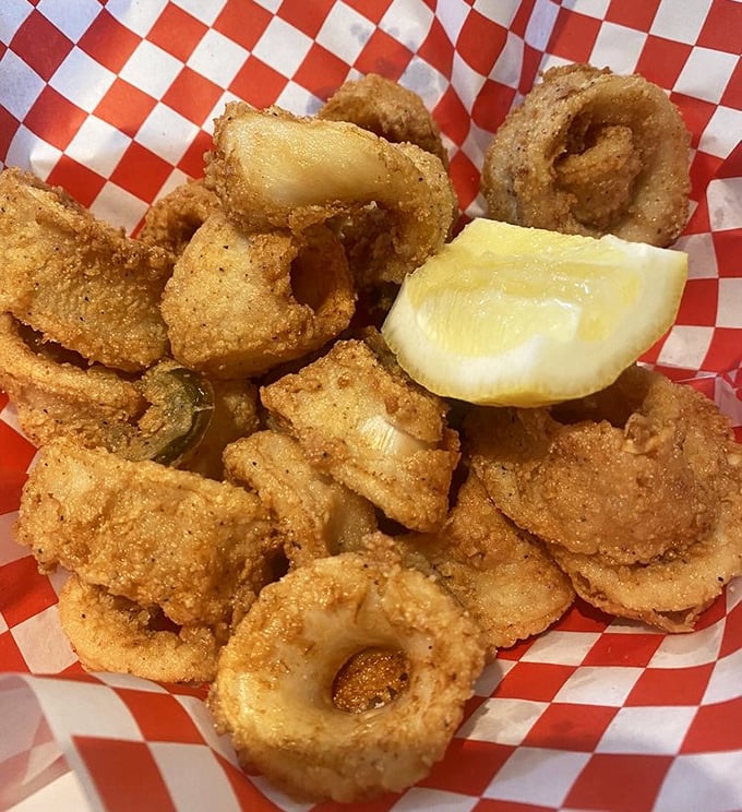 These golden rings of calamari achieve the impossible: crispy exterior, tender interior, and not a hint of rubber band chewiness in sight.