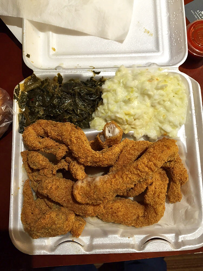 Soul-satisfying comfort on a plate: perfectly fried catfish, collard greens, and mac and cheese. Grandma would approve—and then ask for the recipe.
