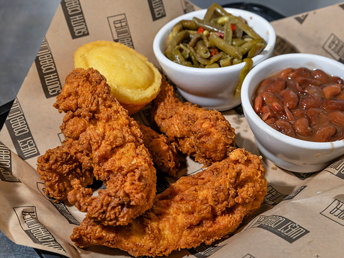 Golden-brown fried chicken that crackles like autumn leaves, paired with classic Southern sides. This basket should come with a warning label. 