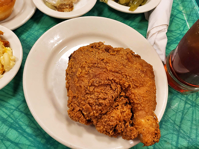 Fried chicken so perfectly golden it deserves its own trophy, with a crust that makes the satisfying crunch heard 'round the dining room.