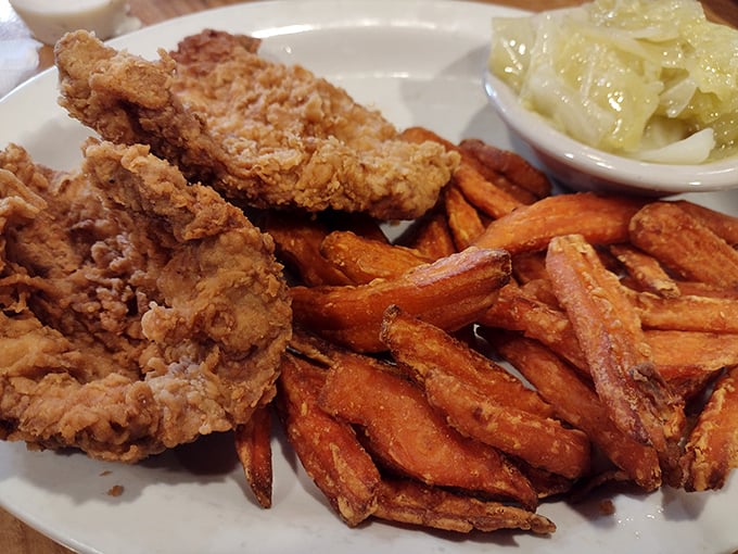 Fried chicken that makes you question why you ever bothered with cereal. Those sweet potato fries are the supporting actors who steal the show.