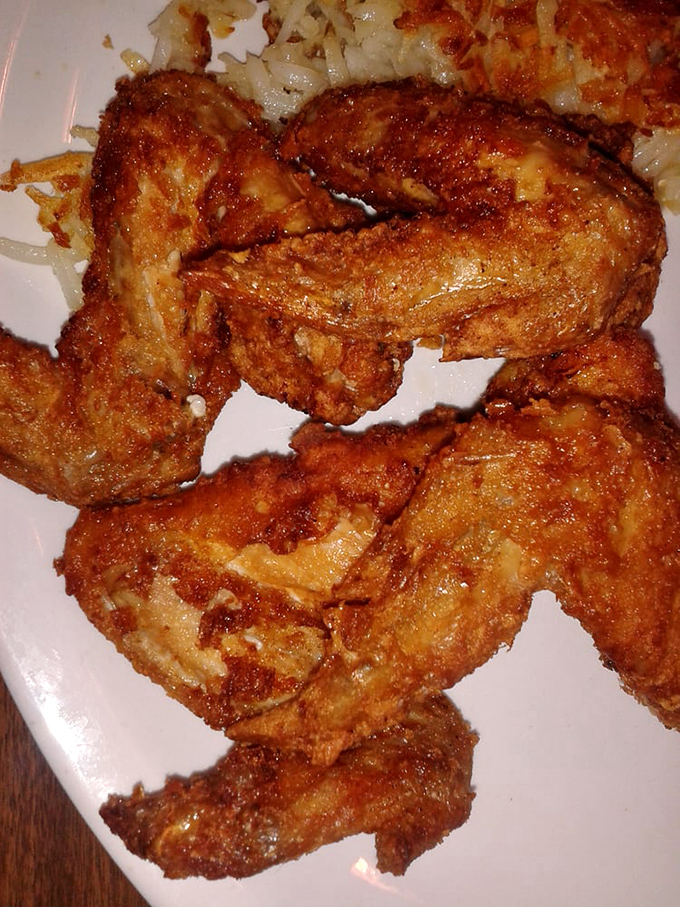 Fried chicken so crispy you can hear it from three tables away. Colonel Sanders would hang up his white suit in defeat.