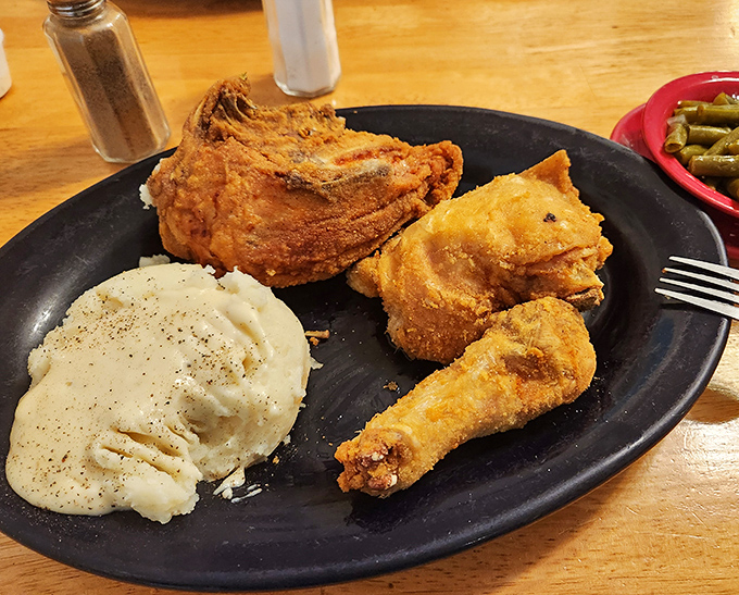 Fried chicken that would make Colonel Sanders jealous, with a golden crust that shatters perfectly with each bite.