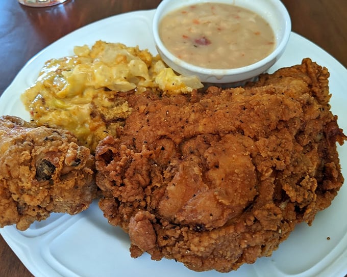 Fried chicken so perfectly golden it deserves its own trophy. That crust could make a grown person weep with joy. 