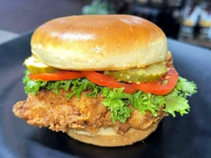 This fried chicken sandwich isn't just a meal, it's an event &ndash; crispy, juicy, and dressed to impress with fresh veggies standing at attention.