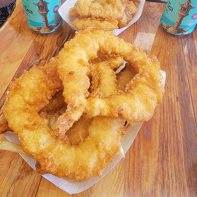 These onion rings aren't just fried &ndash; they're transformed into golden halos of crunch that would make angels jealous of earthly pleasures.