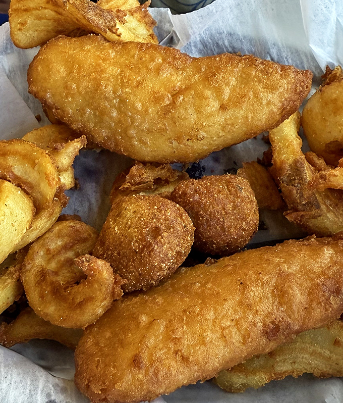 Golden-fried perfection that would make your cardiologist wince and your taste buds sing—crispy outside, tender inside, worth every delicious calorie.