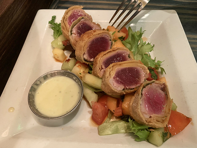 Seared tuna that's dressed for success. Each slice reveals that perfect ruby center that seafood aficionados dream about at night.