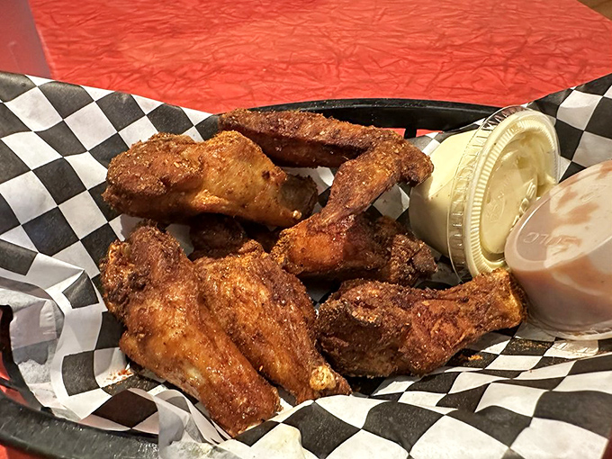 These wings aren't just smoked, they're transformed. Served with dipping sauces that could make cardboard taste magnificent.
