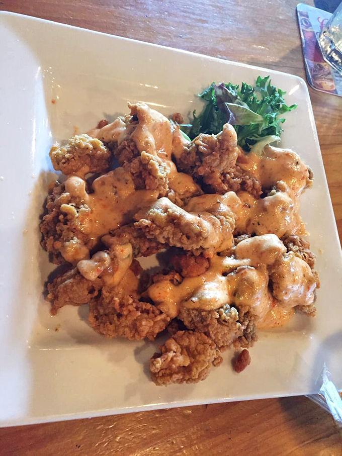 Fried oysters so perfectly golden and saucy, they might make you temporarily forget your allegiance to team burger.