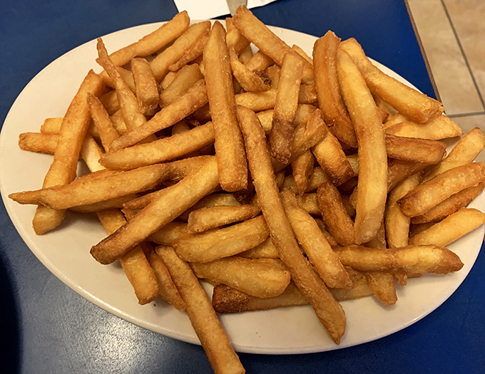 Golden fries that achieve the impossible balance of crispy exterior and fluffy interior&mdash;the supporting actor that sometimes steals the show.
