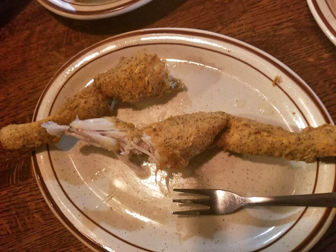 Frog legs: where chicken meets fish in the culinary twilight zone. That golden cornmeal coating is the Midwest's answer to tempura.