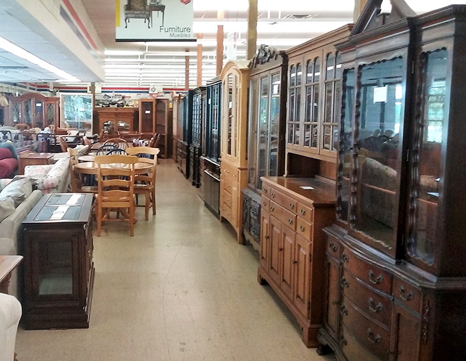 Solid wood furniture with stories to tell lines this aisle of possibility. These aren't just cabinets and hutches&mdash;they're future family heirlooms waiting for their next chapter.