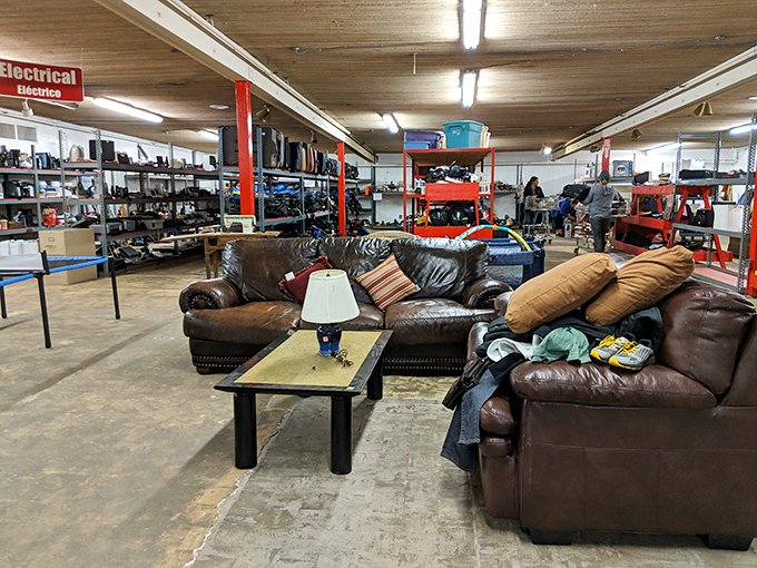 The furniture section: where leather sofas with stories to tell invite you to sit and contemplate your next thrifting move.