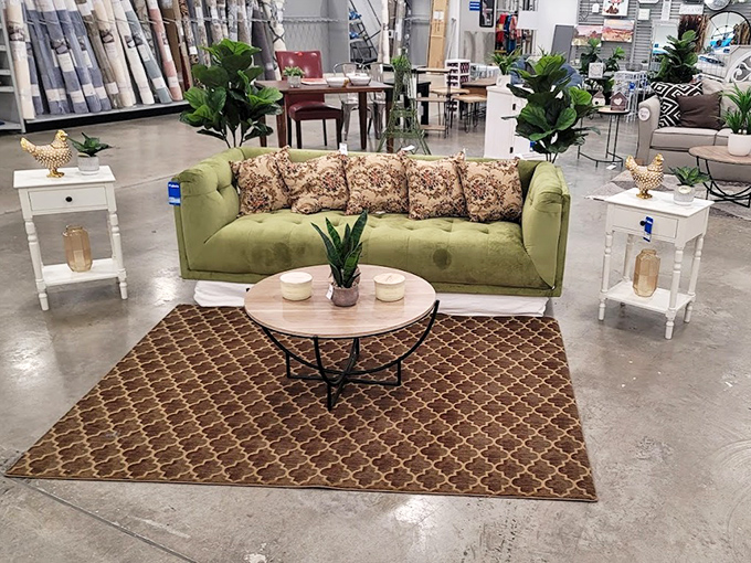 Living room goals that won't empty your savings account &ndash; this stylish green sofa setup proves good taste doesn't require a trust fund.