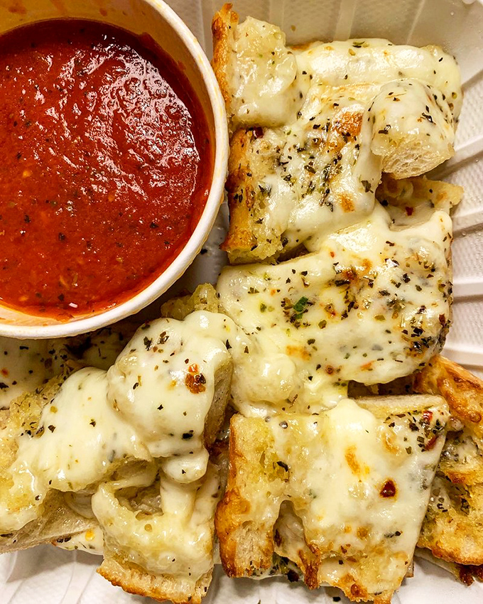Golden, cheesy, garlicky perfection: this garlic cheese bread is what dreams are made of, one melty bite at a time.