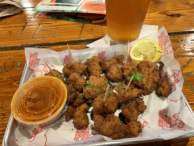 These golden-fried gator tail bites aren't just Florida on a plate&mdash;they're a crunchy initiation ritual. The dipping sauce is practically mandatory.