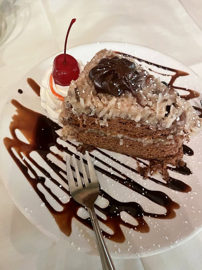 The Black Forest cake isn't just dessert; it's architecture&mdash;layers of chocolate, cream, and cherries creating a monument to sweet indulgence.