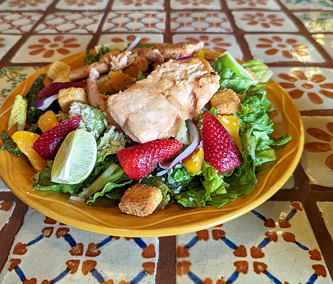 Who knew a salad could be this exciting? Grilled salmon and fresh strawberries create a protein-packed fiesta that your doctor would actually approve of.