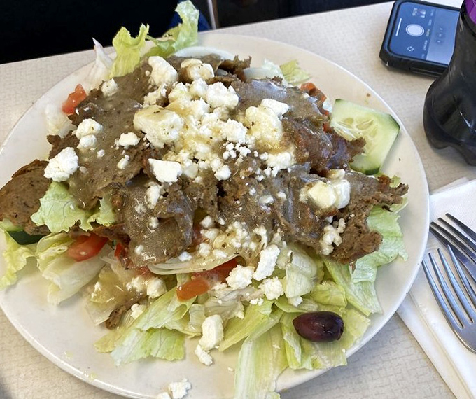 The Greek salad here isn't just a side dish&mdash;it's a Mediterranean vacation for your taste buds, complete with feta that actually tastes like feta.